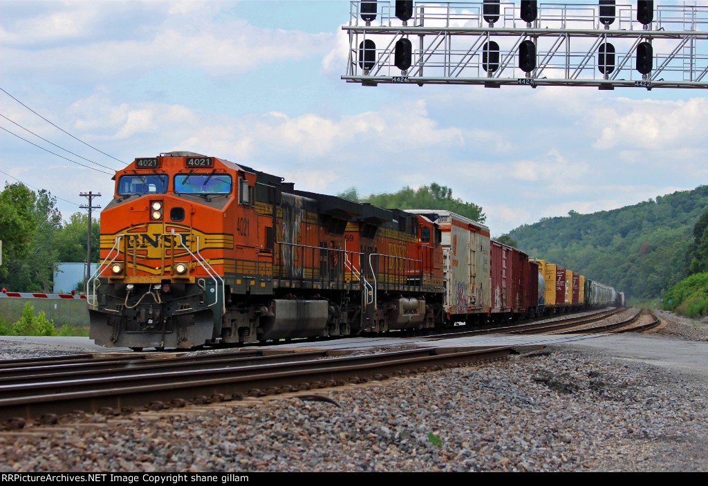 BNSF 4021 Heads up a Wb Freight down main 1.